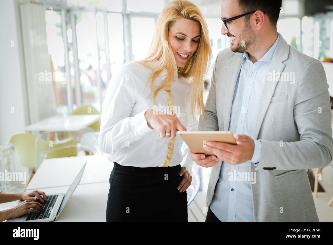 Image of two successful business partners working at meeting Stock ...