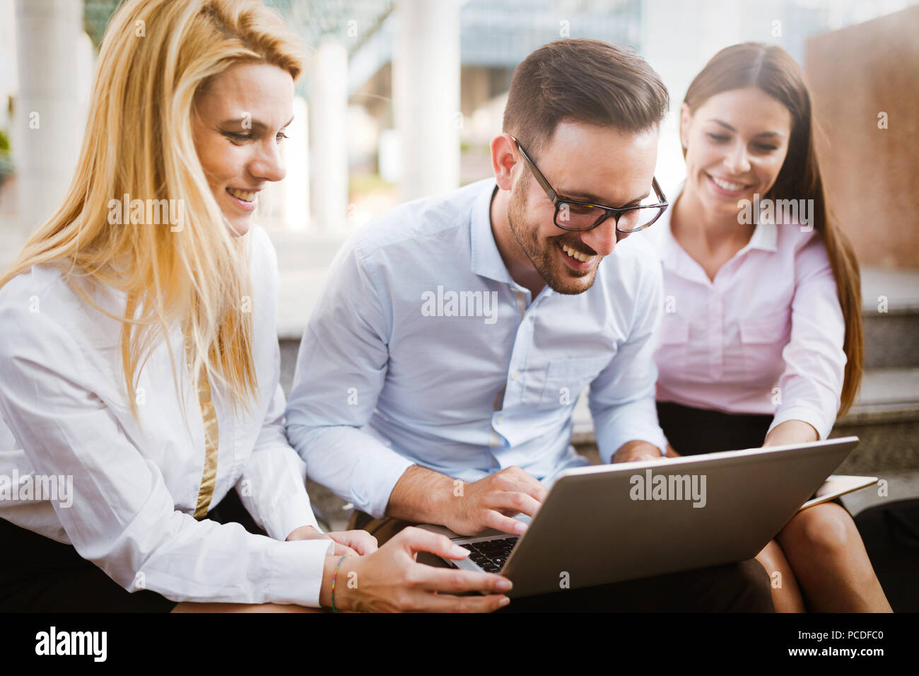 Business people having fun in office Stock Photo - Alamy