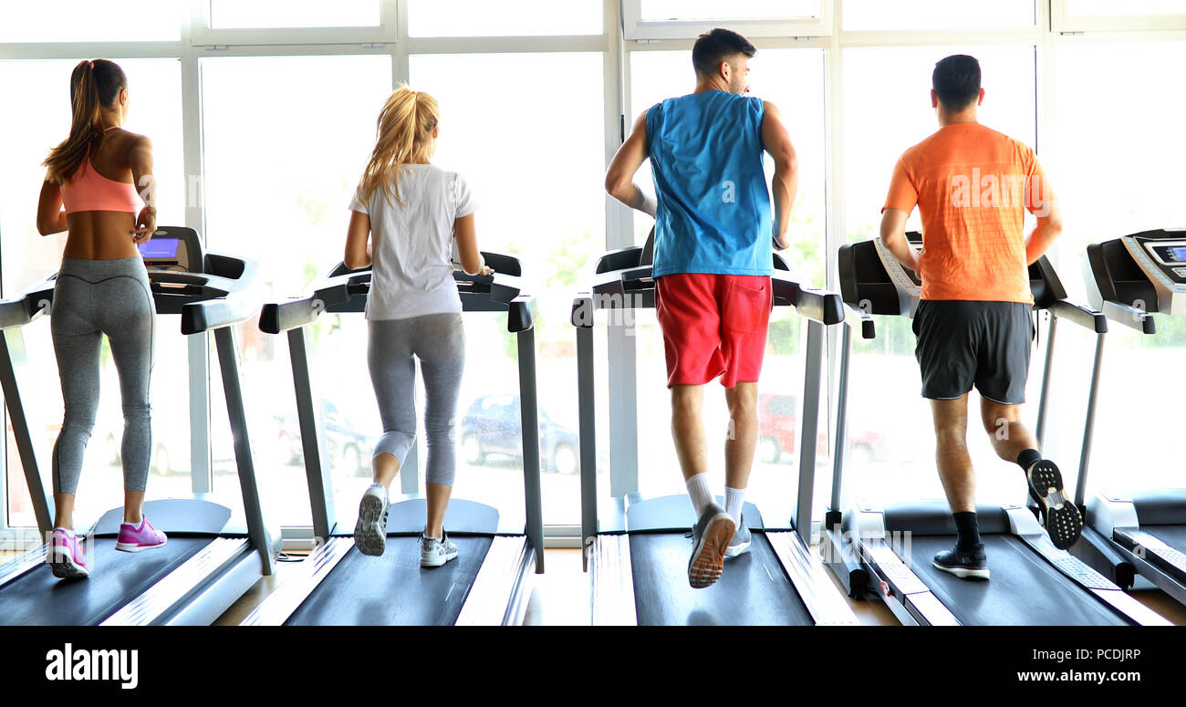 People running on indoor track hi-res stock photography and images - Alamy