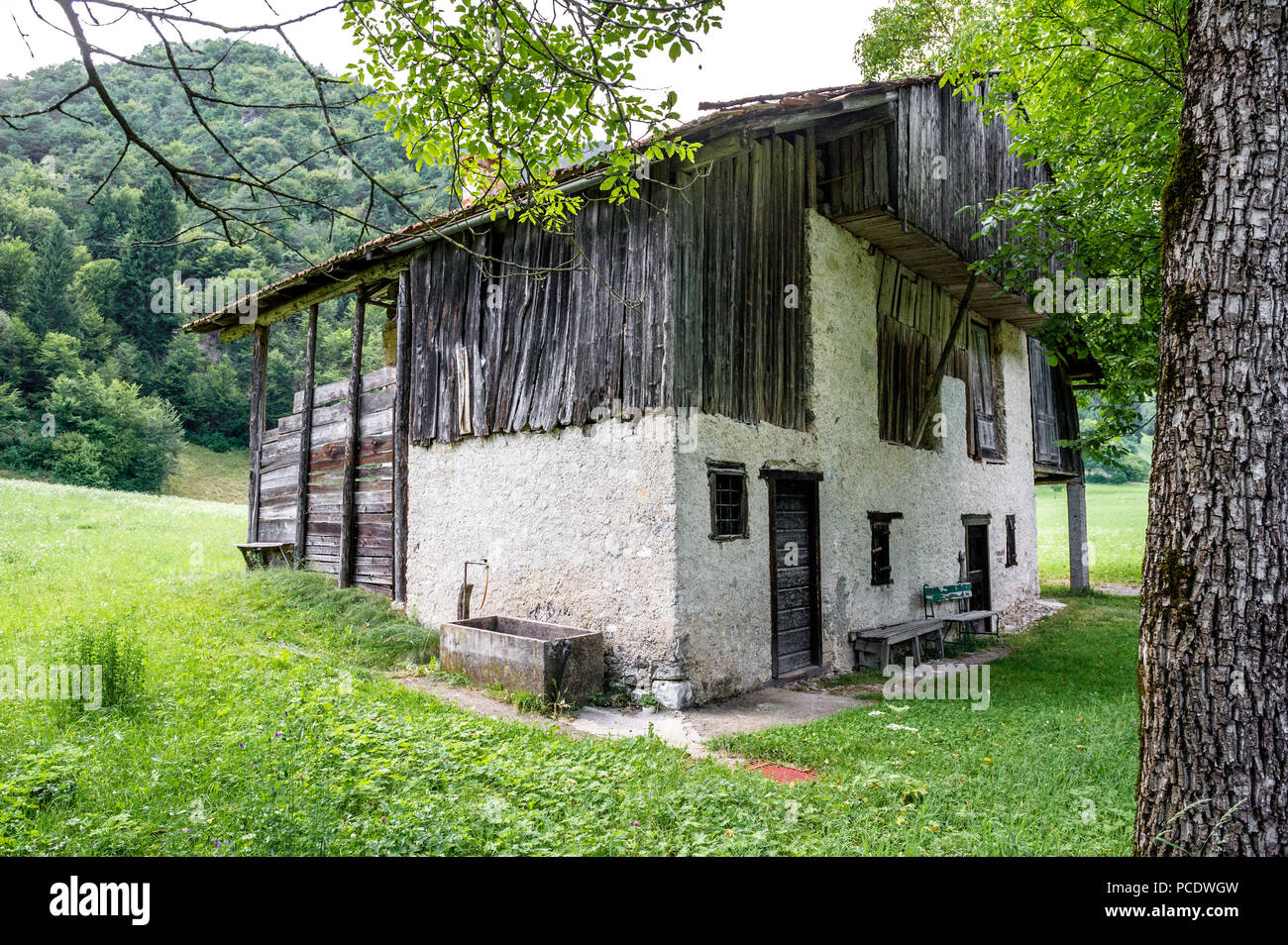 Traditional Italian alpine farm buildings Stock Photo - Alamy