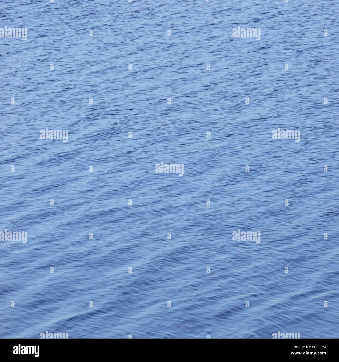 Vertical ocean water waves background pattern, abstract blue gentle ...