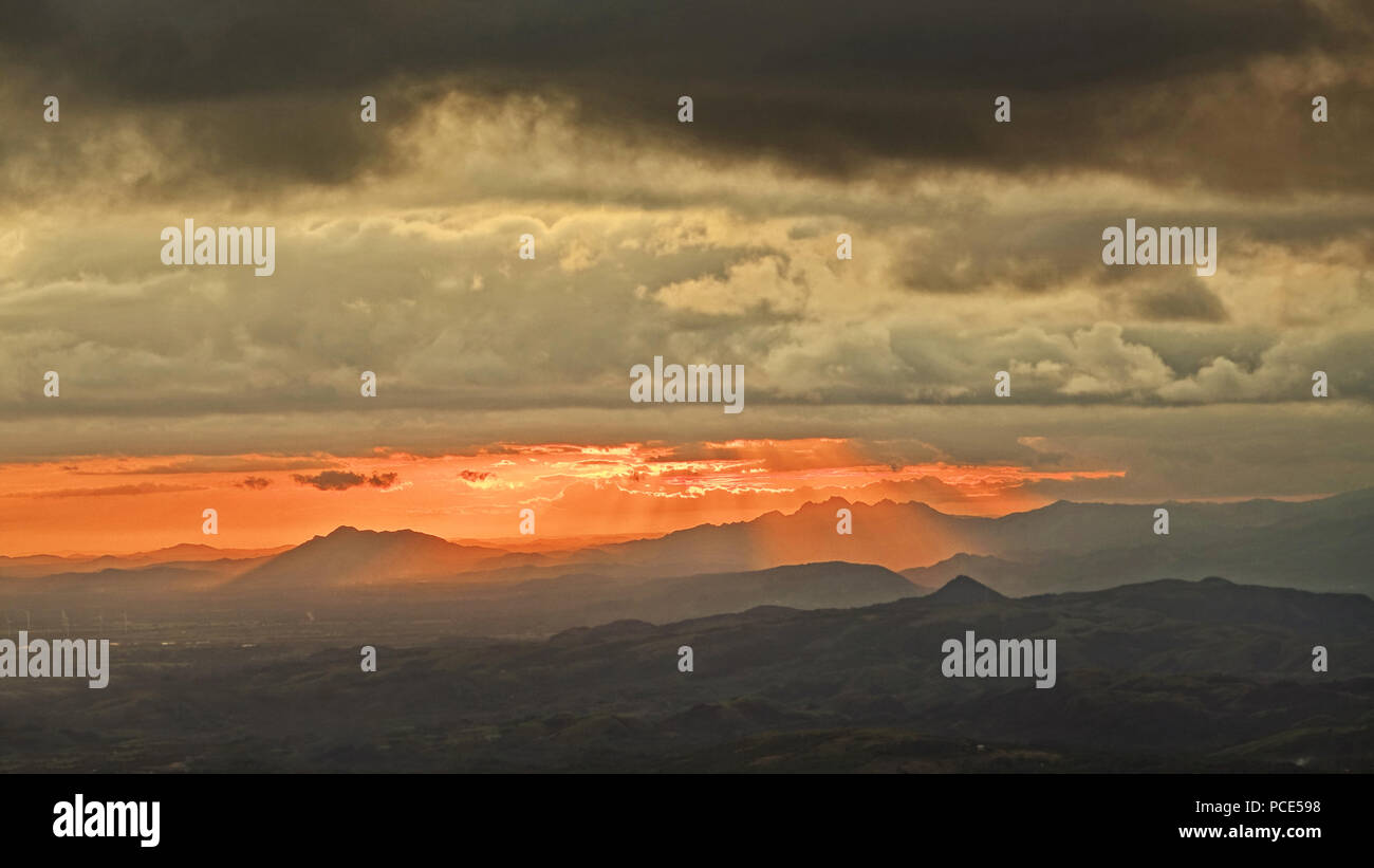 Sun shining over road hi-res stock photography and images - Alamy