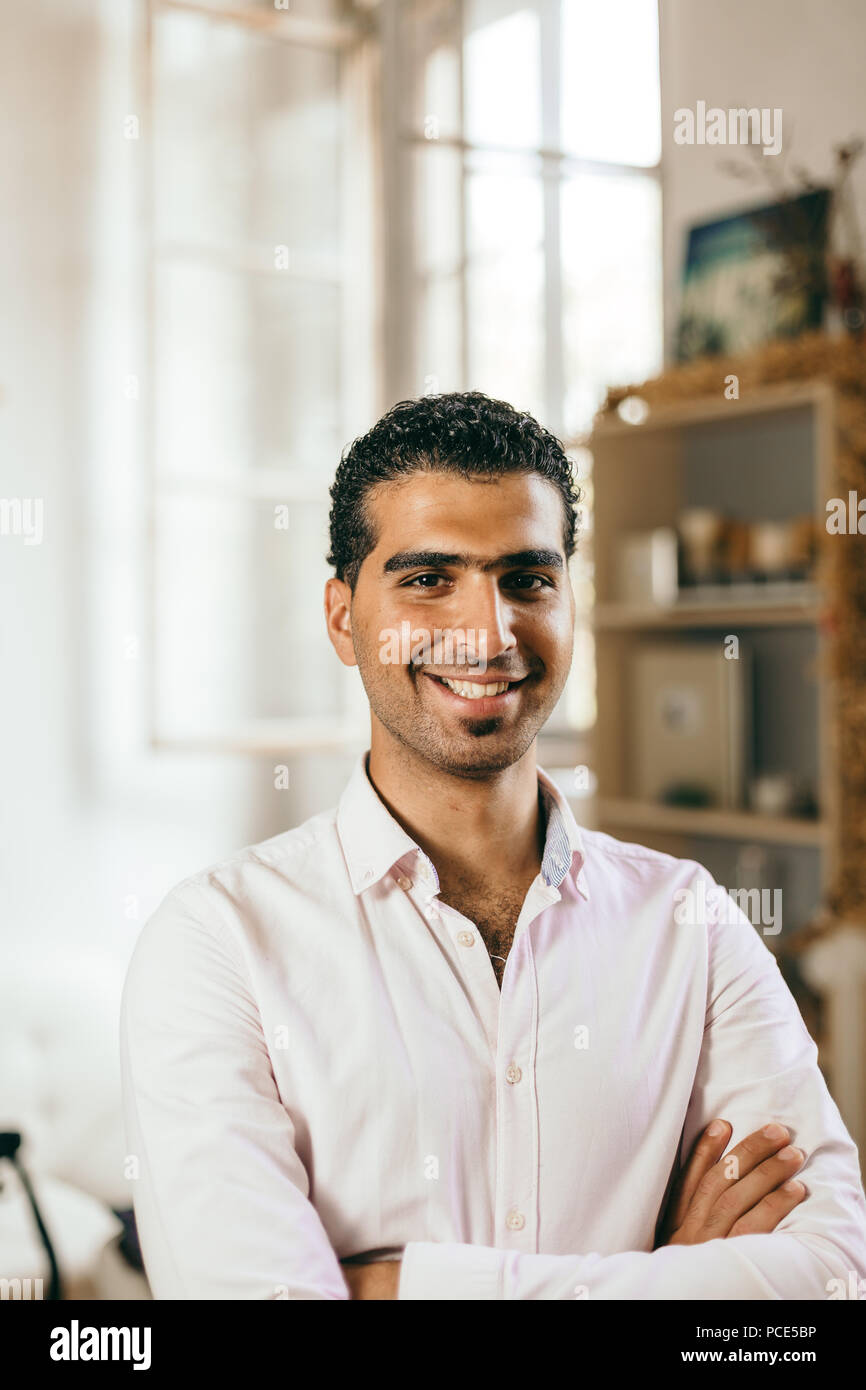 Cheerful and confident Syrian man smiling Stock Photo - Alamy