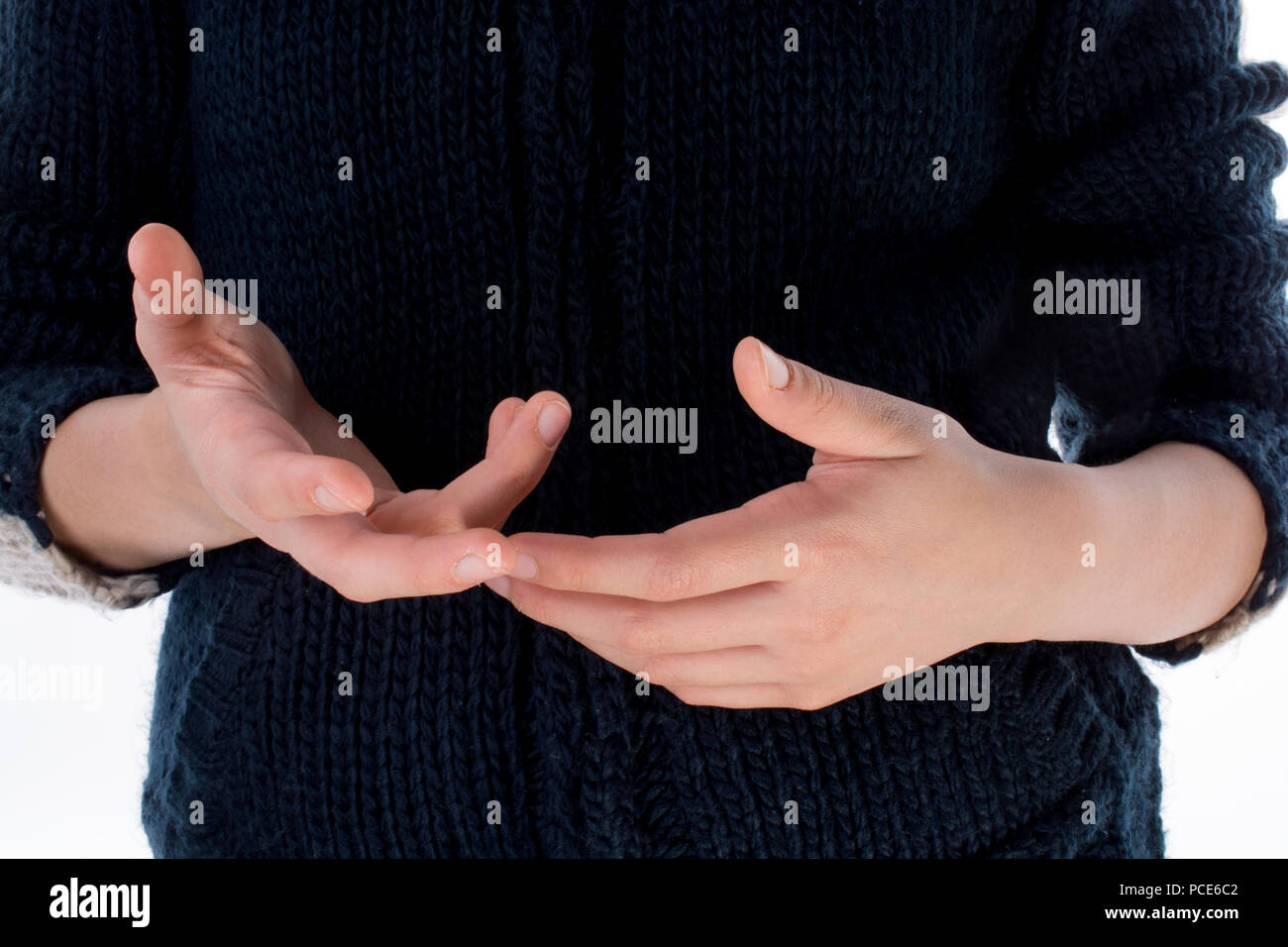 Hand making a gesture on a white background Stock Photo - Alamy