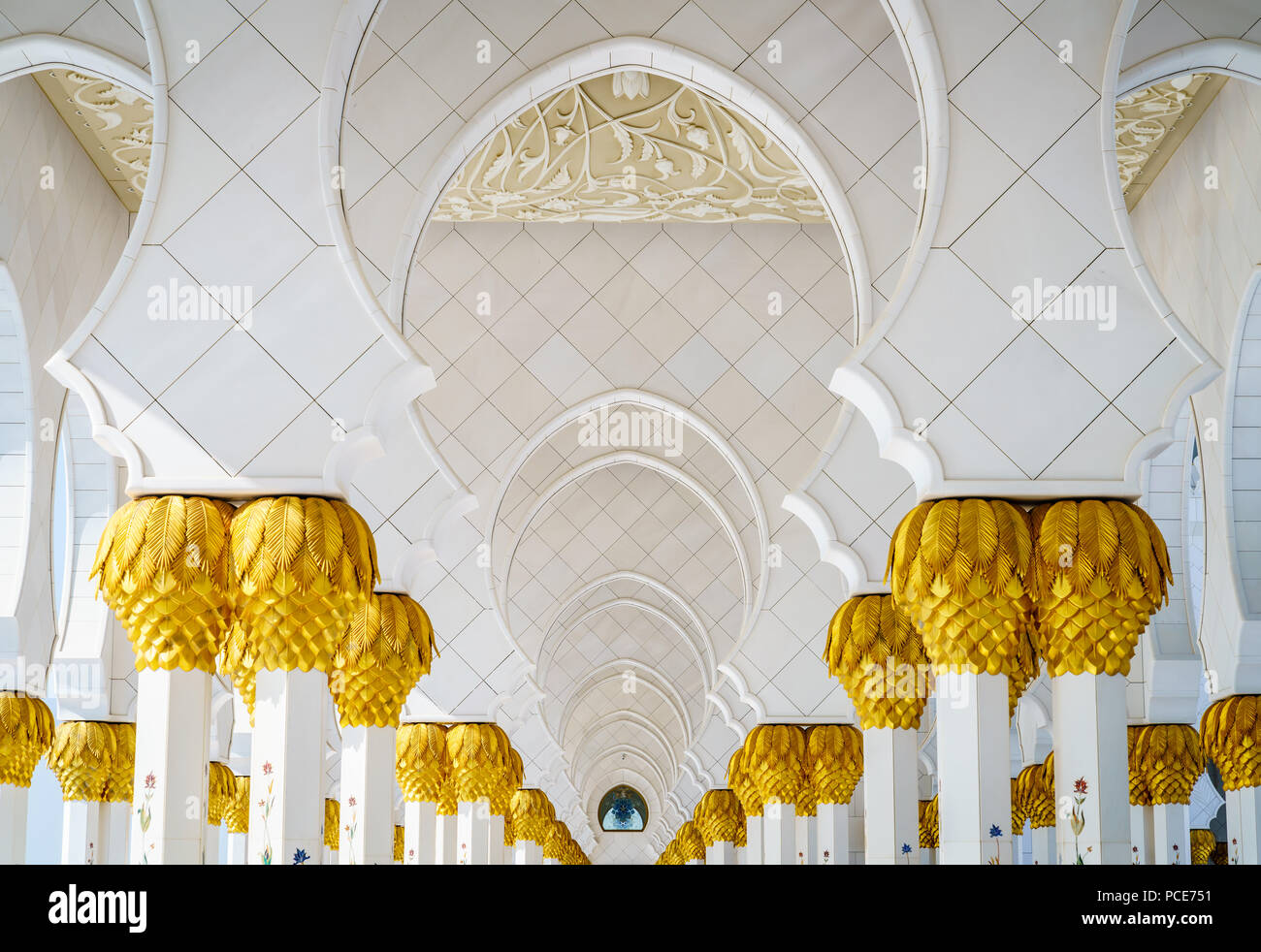A colonnade in Sheikh Zayed Grand Mosque in Abu Dhabi, UAE Stock Photo ...