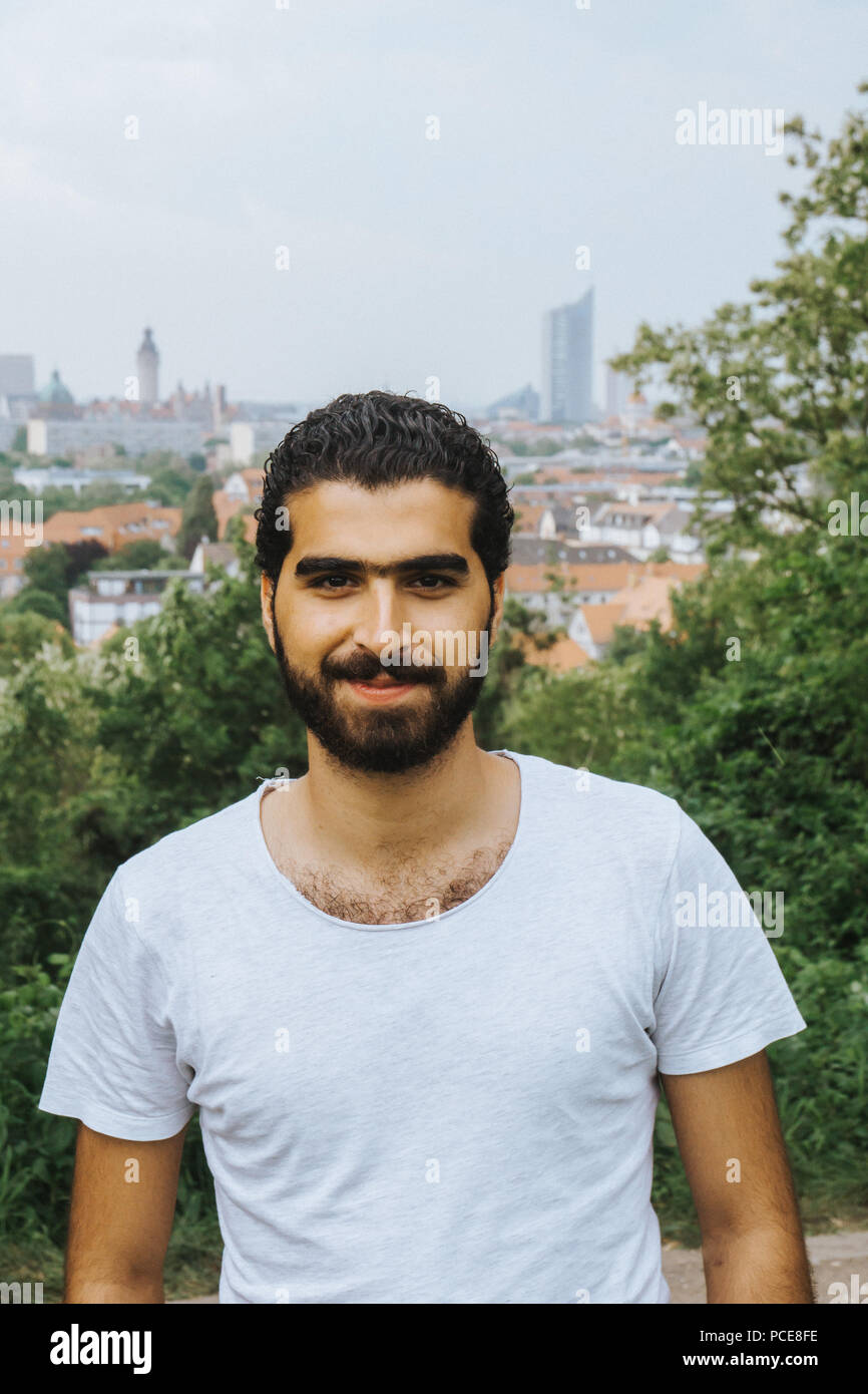 Outdoor portrait of cheerful Syrian man Stock Photo - Alamy