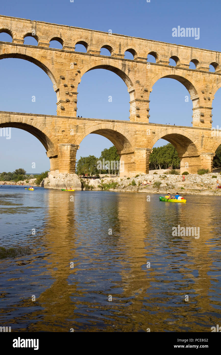 NIMES, FRANCE - August 18, 2012: People near the famous landmark ...