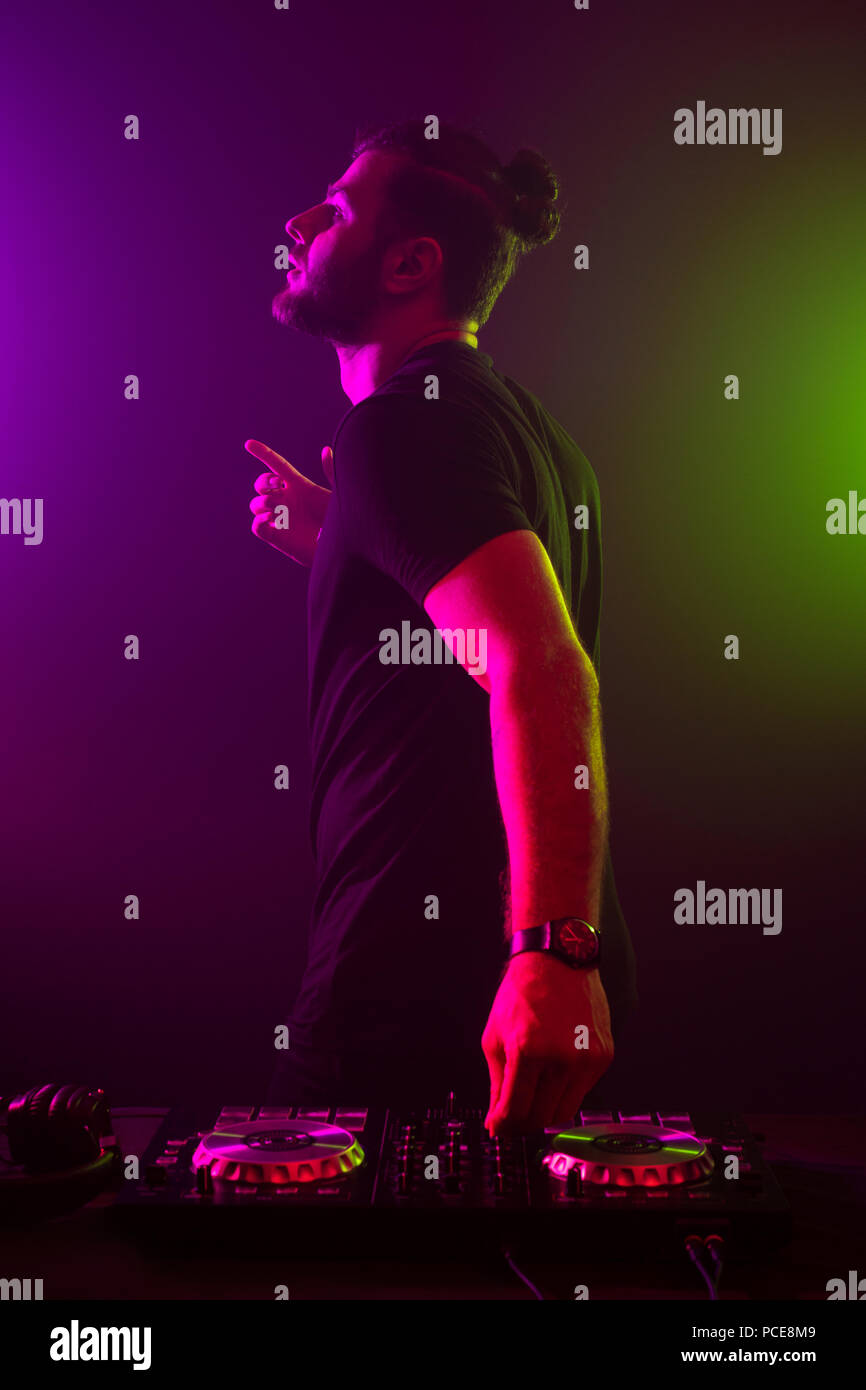 Dj Behind Turntables High Resolution Stock Photography and Images - Alamy