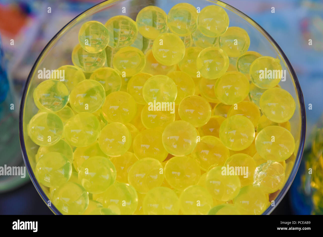 Glass balls in a storage vessel on a bright day Stock Photo - Alamy