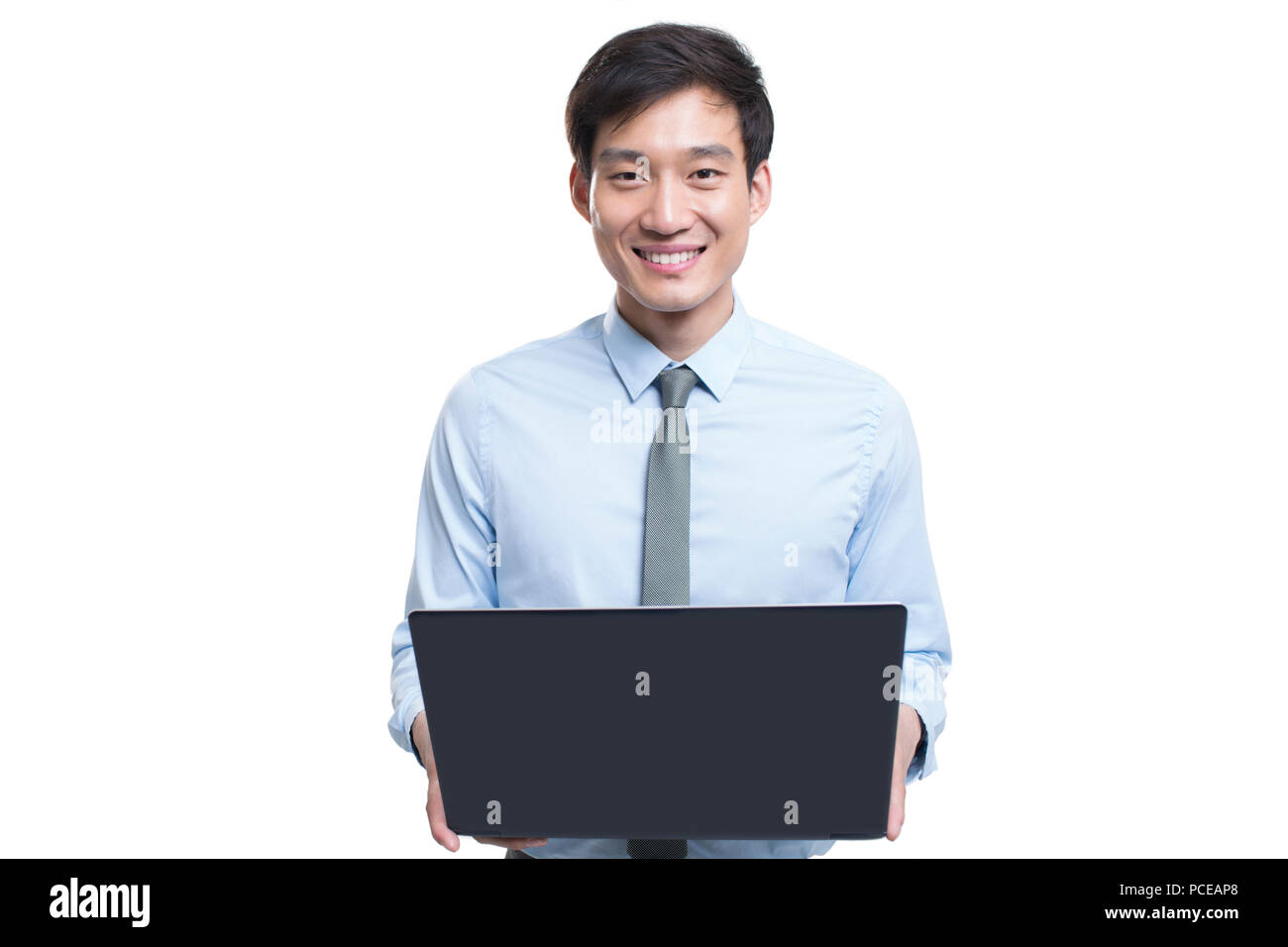 Professional businessman laptop looking out hi-res stock photography ...