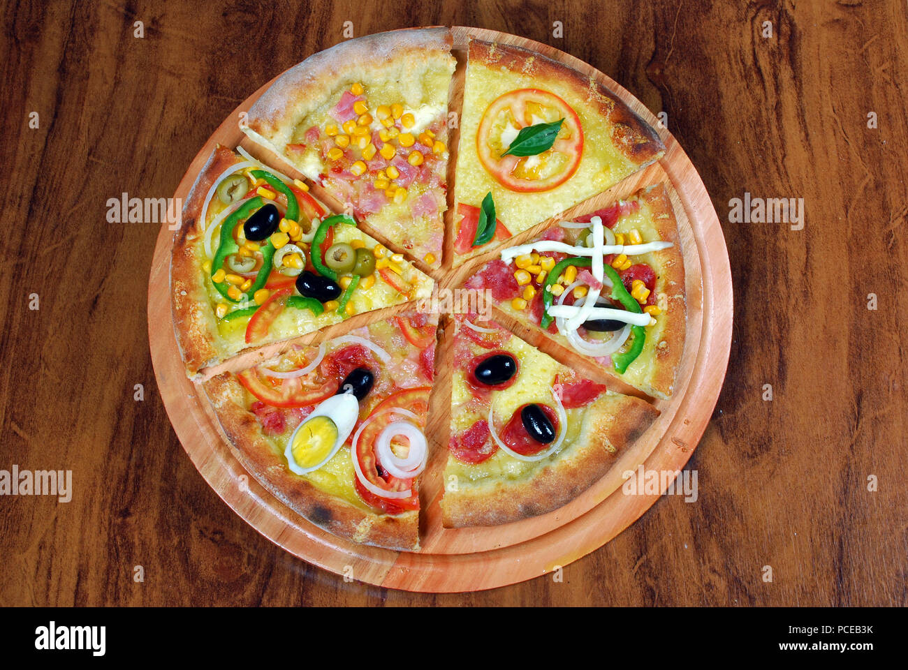pizza slices various flavors Stock Photo - Alamy