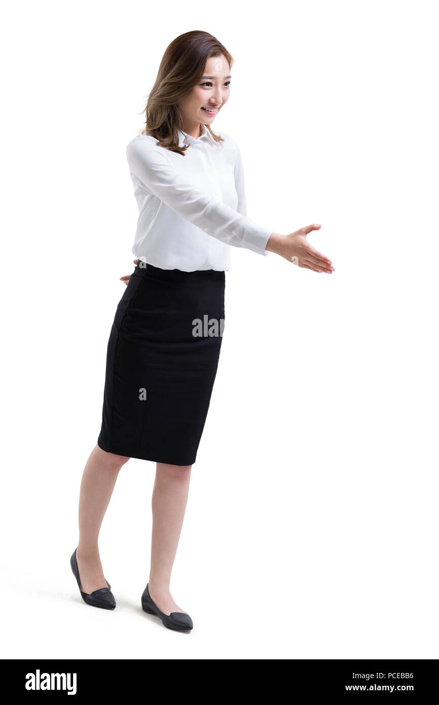 Young Chinese businesswoman extending hand for handshake Stock Photo ...