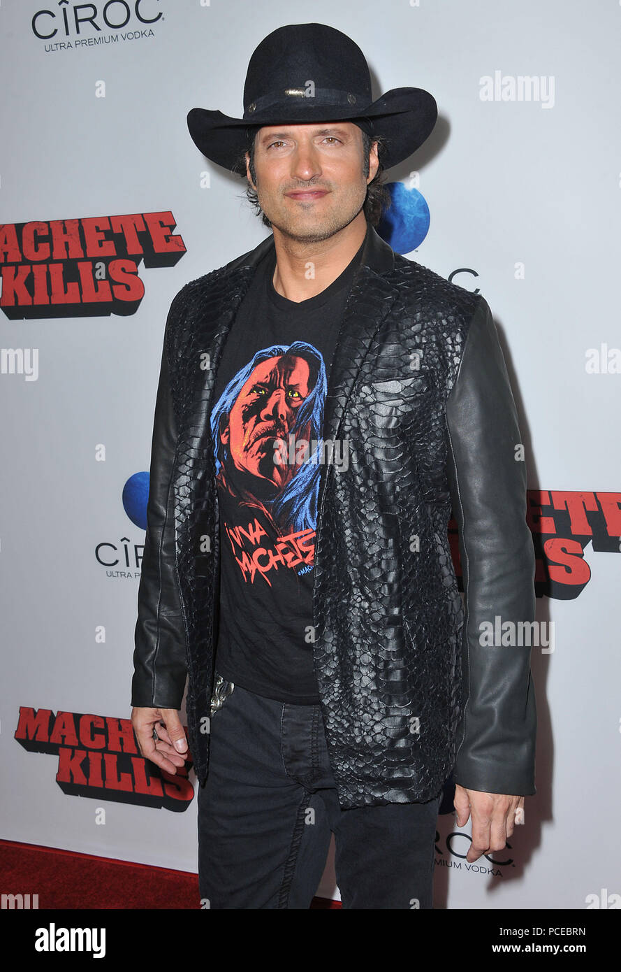 Robert Rodriguez arriving at the Machete Kills Premiere at the Regal ...