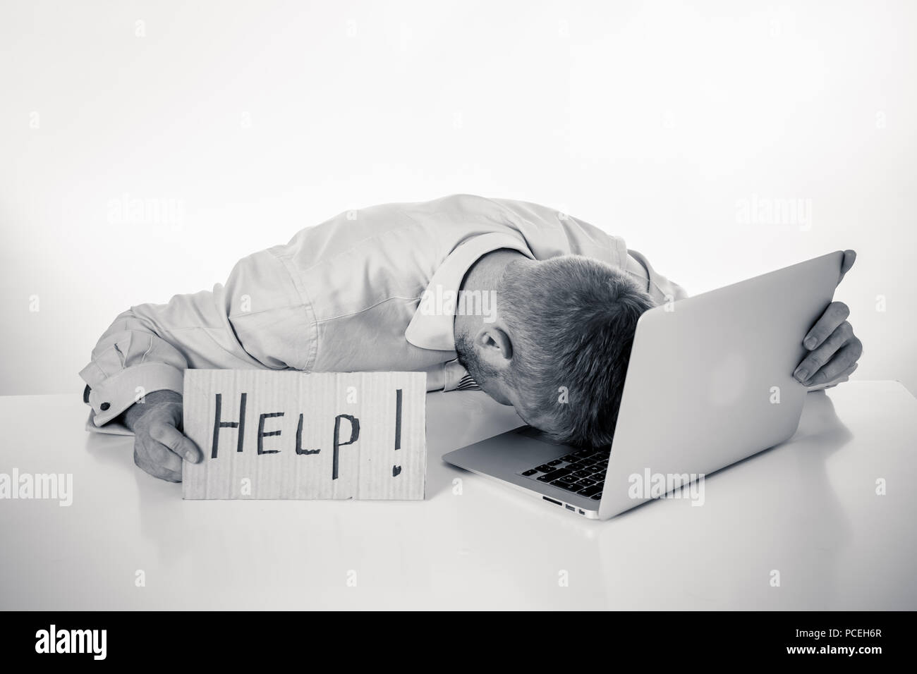 Office man working help computer hi-res stock photography and images ...