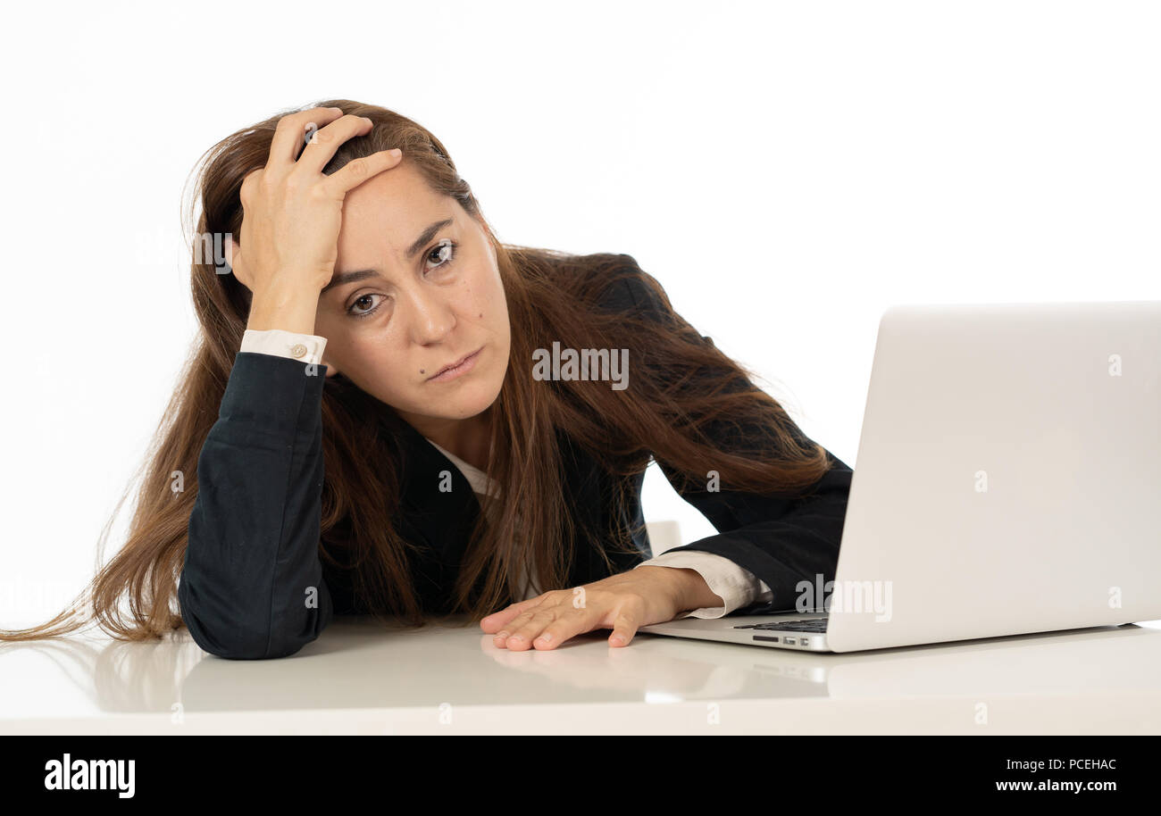 Business woman desperate with computer Stock Photo - Alamy