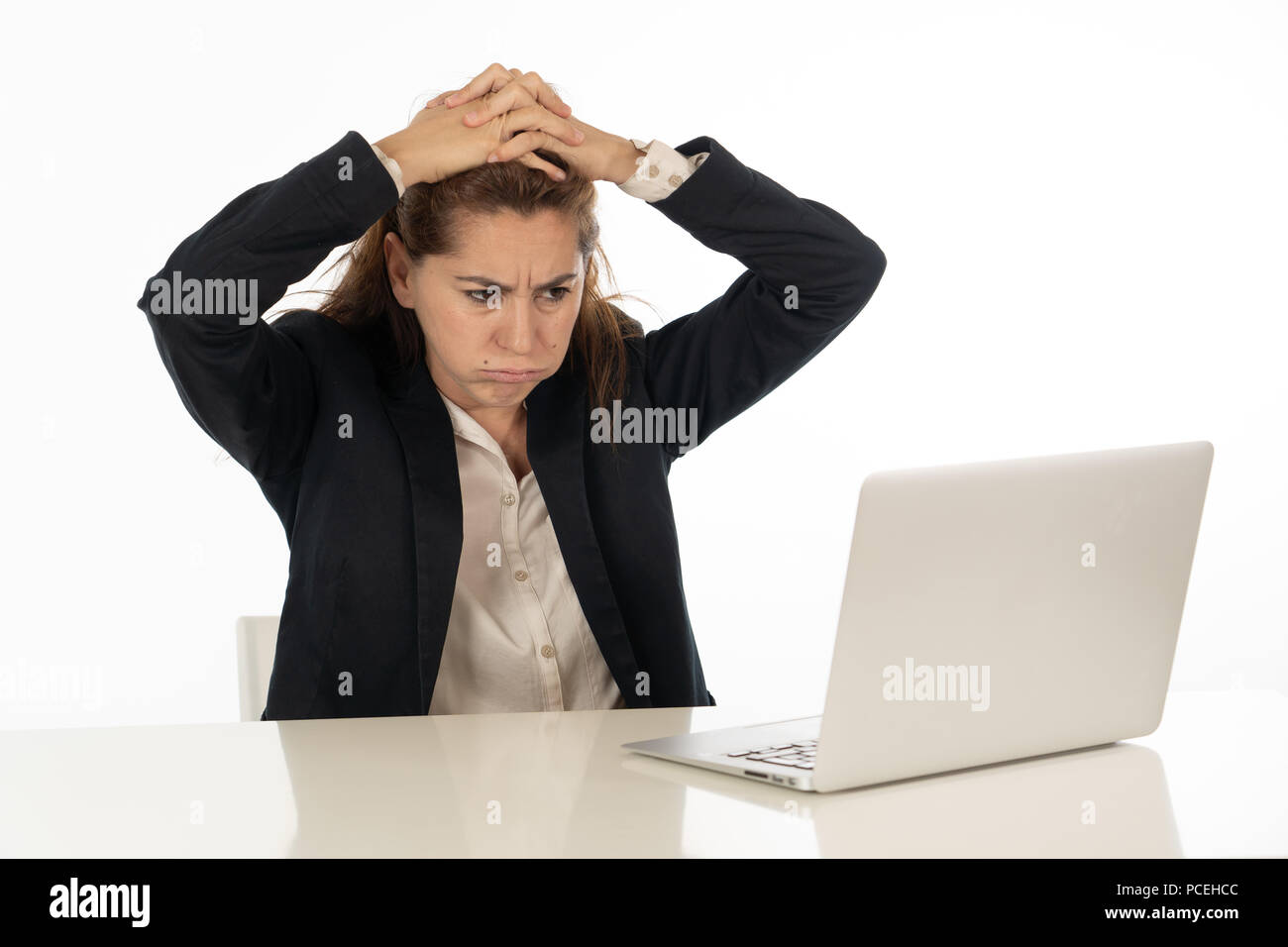 Business woman desperate with computer Stock Photo - Alamy