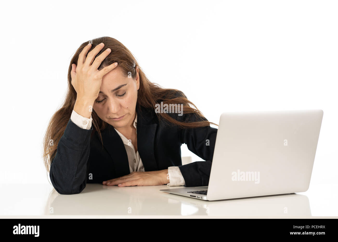 Business woman desperate with computer Stock Photo - Alamy