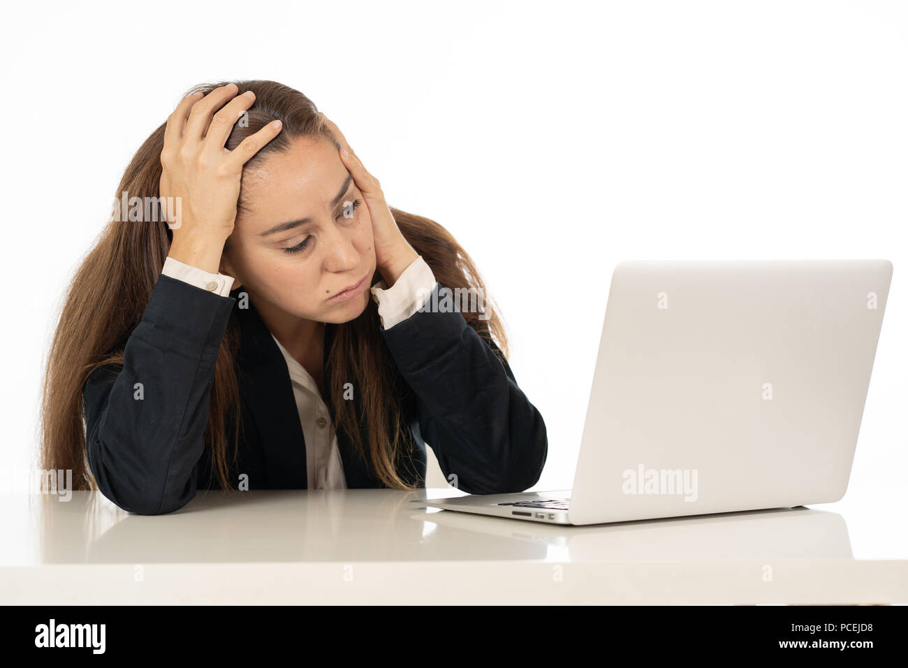 Business woman desperate with computer Stock Photo - Alamy