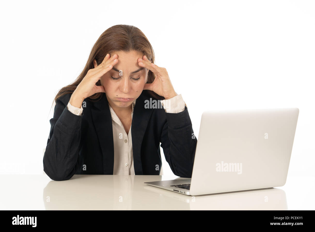 Business woman desperate with computer Stock Photo - Alamy