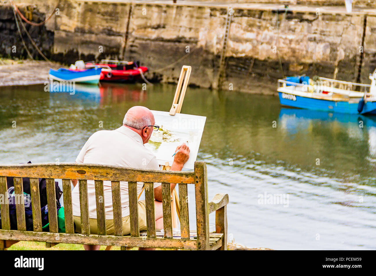 Artist painting craster northumberland hi-res stock photography and ...