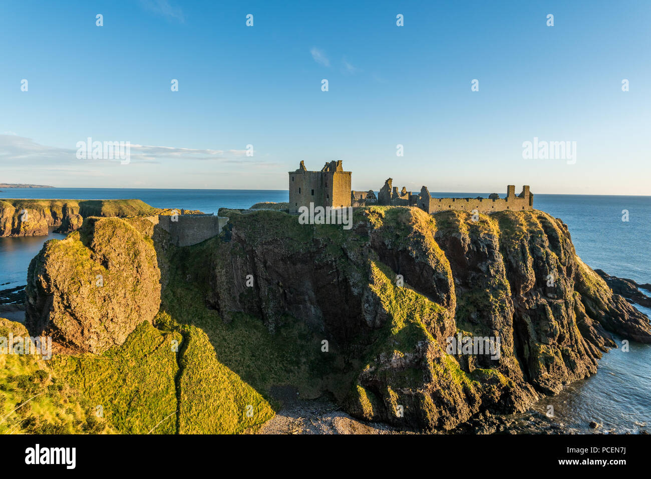 Dunottar Castle, cliffs and rocks at sunrise Stock Photo - Alamy