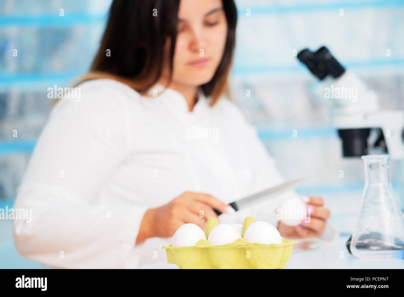 Scientist analyzing egg hi-res stock photography and images - Alamy