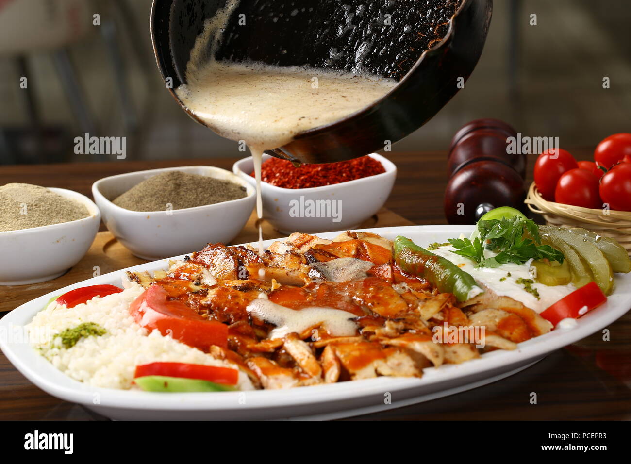 Turkish iskender kebab - Chicken iskender kebap Stock Photo - Alamy