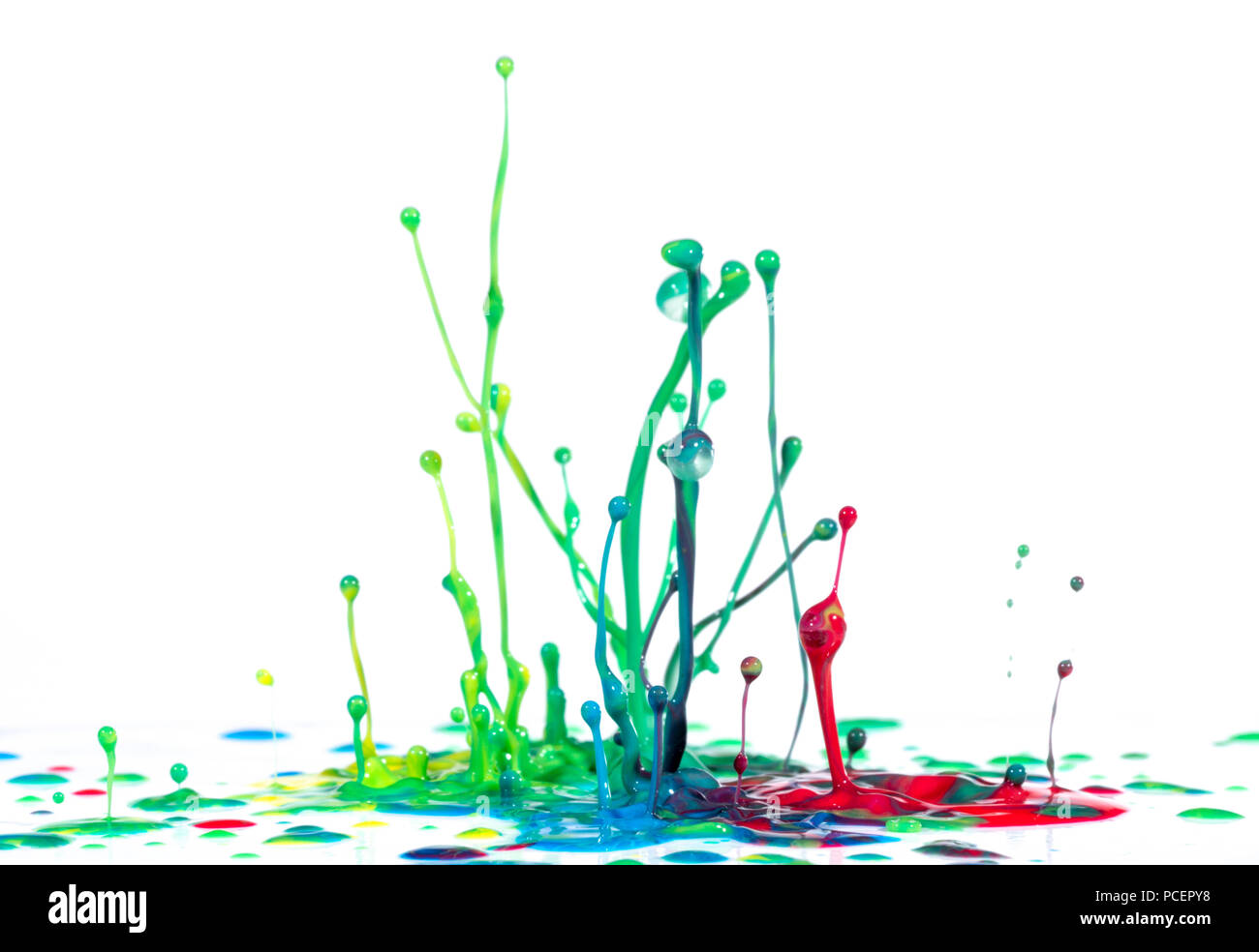 Isolated shot of paint splashing on white Stock Photo - Alamy