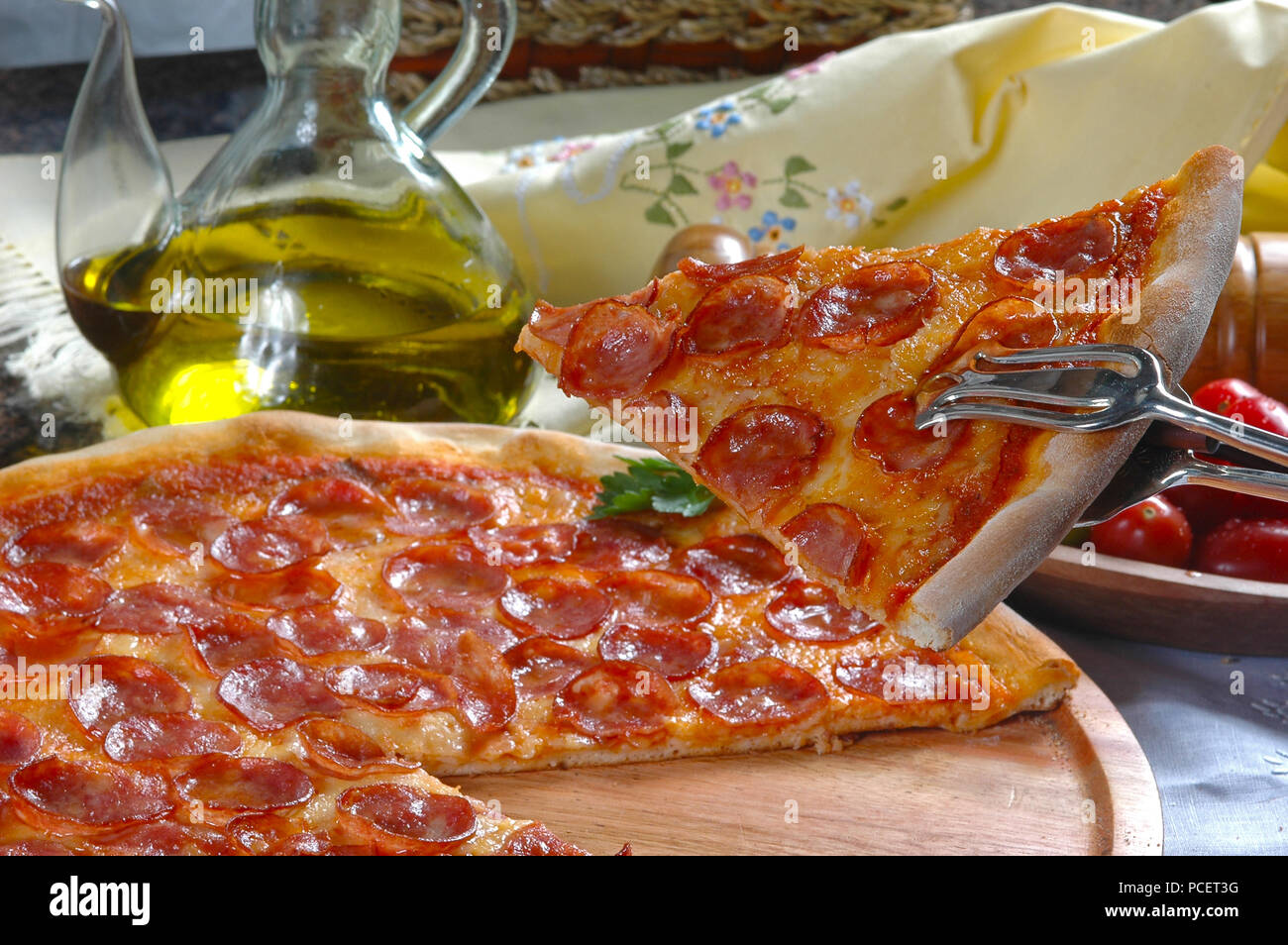 Pizza pepperoni with olive oil Stock Photo - Alamy