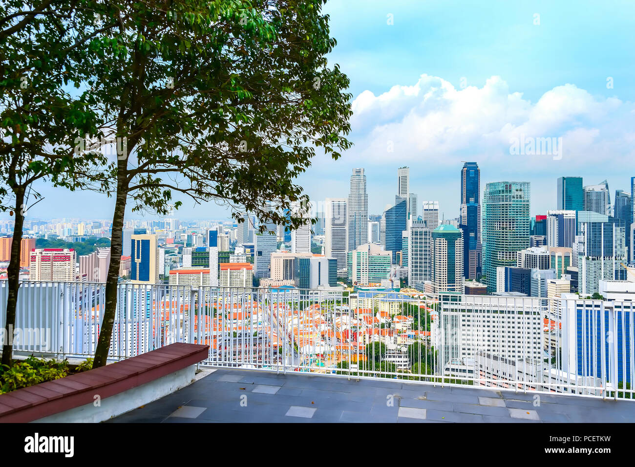 Aerial cityscape of Singapore metropolis from the viewpoint with bench ...