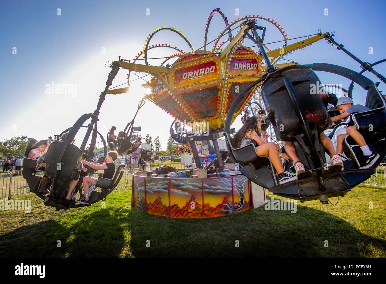 Exhilarated boy on ride hi-res stock photography and images - Alamy