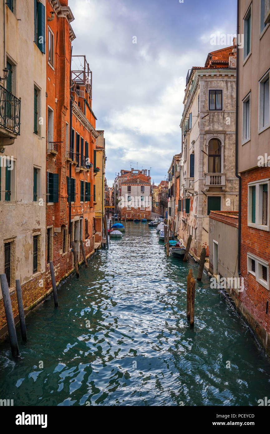 View of the street canal in Venice, Italy. Colorful facades of old ...