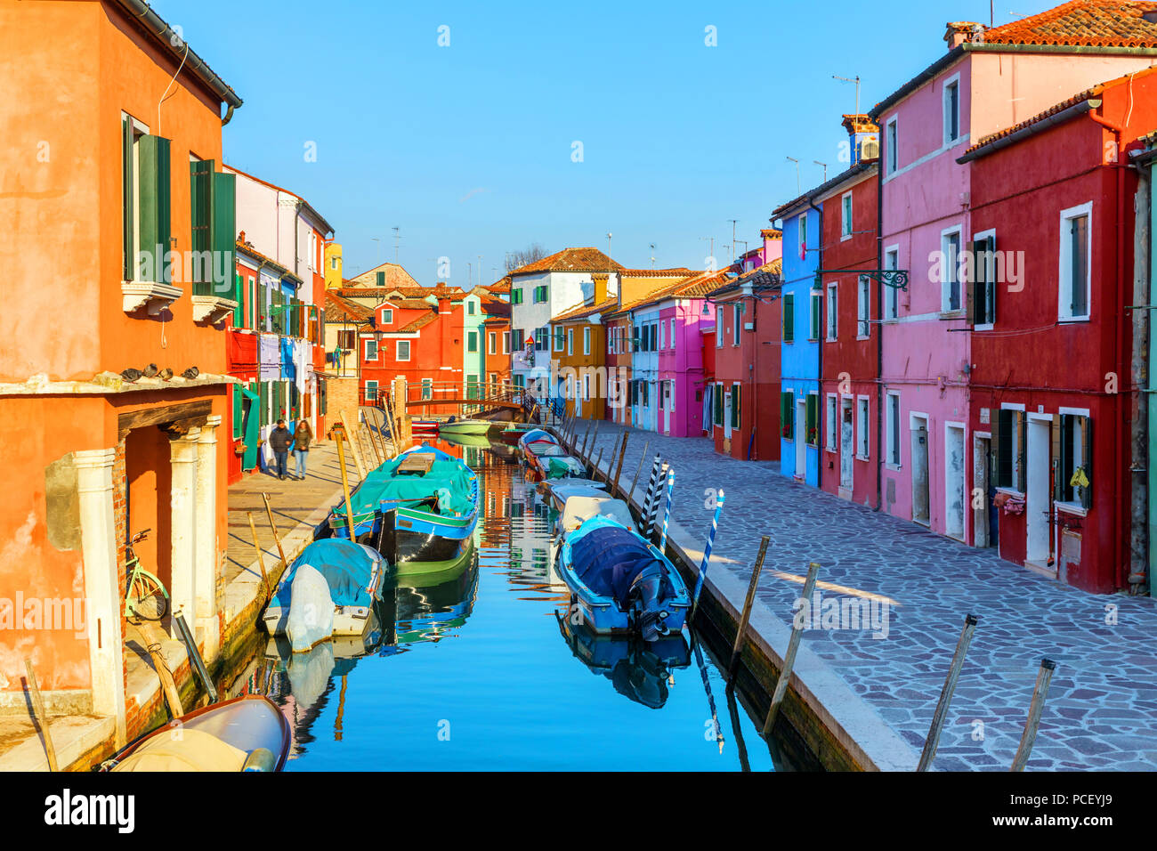 Street with colorful buildings in Burano island, Venice, Italy ...