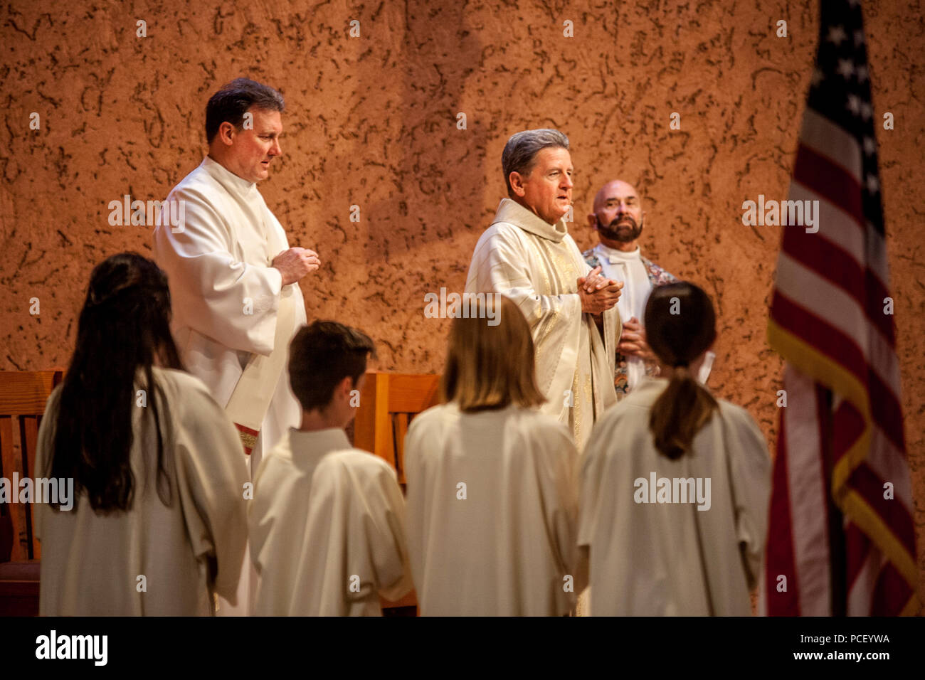 Priest at altar rear view hi-res stock photography and images - Alamy