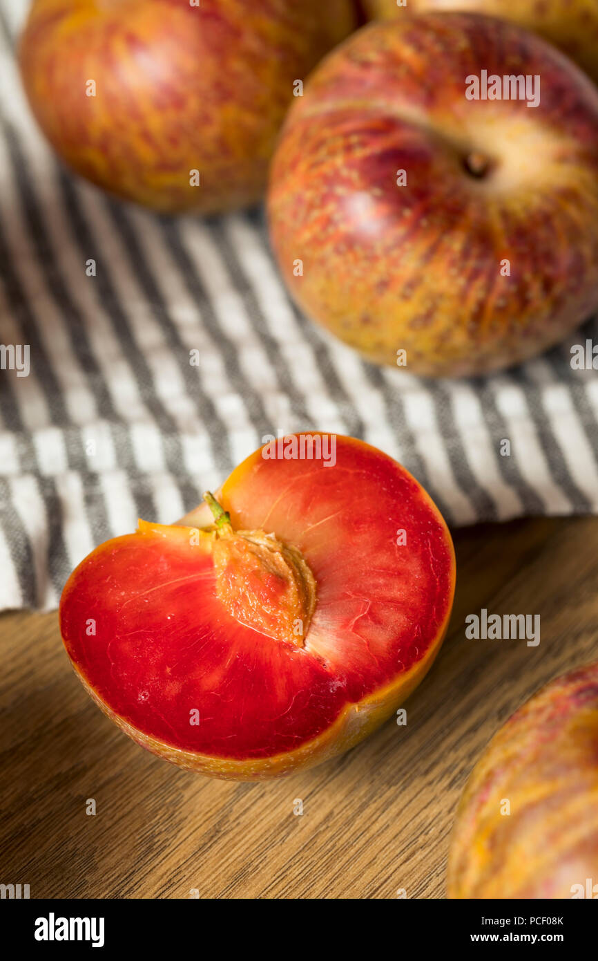Organic Red Mottled Pluots Ready to Eat Stock Photo - Alamy