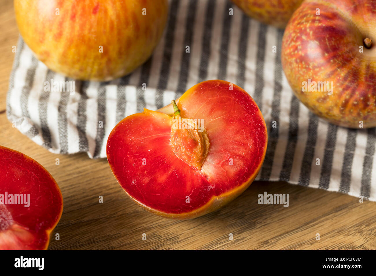 Organic Red Mottled Pluots Ready to Eat Stock Photo - Alamy