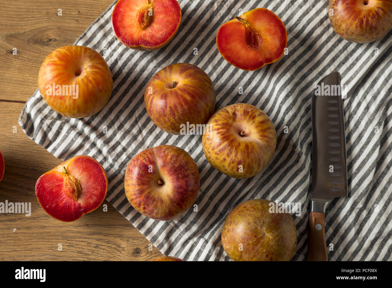 Organic Red Mottled Pluots Ready to Eat Stock Photo - Alamy