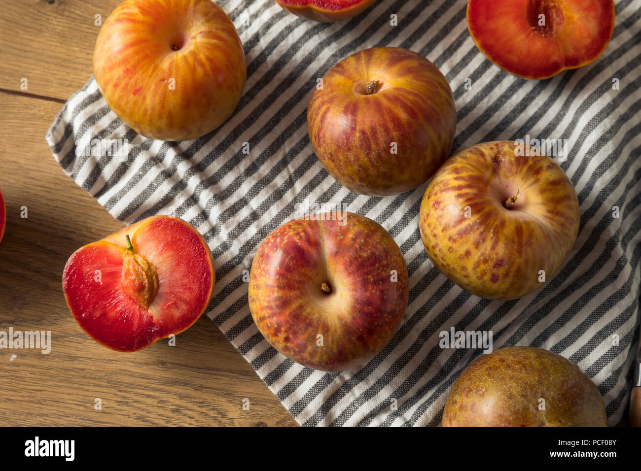 Organic Red Mottled Pluots Ready to Eat Stock Photo - Alamy