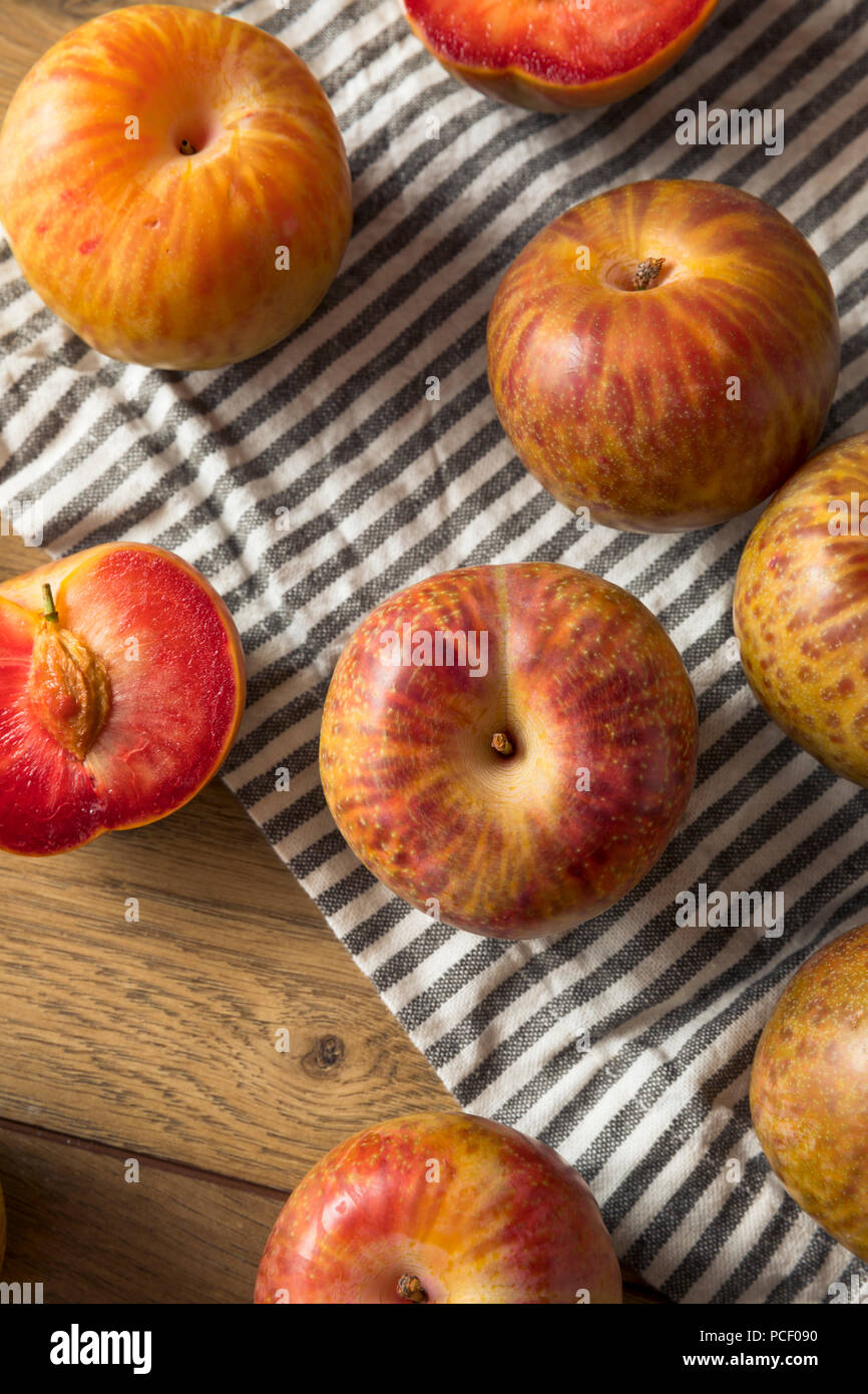Organic Red Mottled Pluots Ready to Eat Stock Photo - Alamy