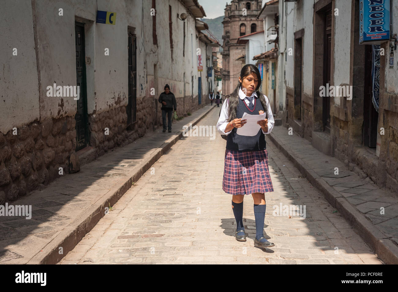 April 21, 2014 - Cusco, Peru. Young girl heading to school in the ...
