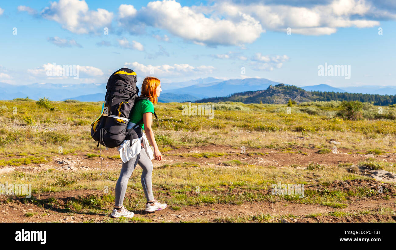 Travel Lifestyle and survival concept rear view. Hiking woman with ...
