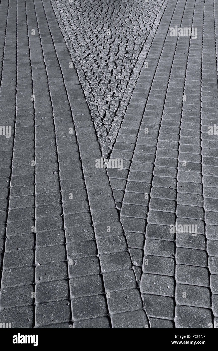 Diagonal lines and gray paving stones of the pavement in the city Stock ...