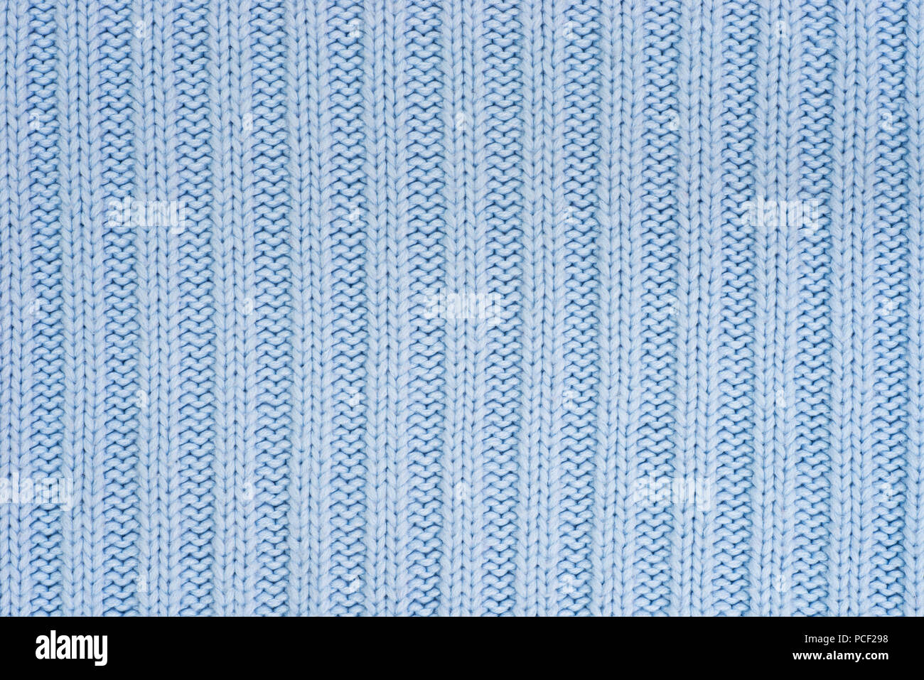 blue color knitwear texture background macro Stock Photo - Alamy