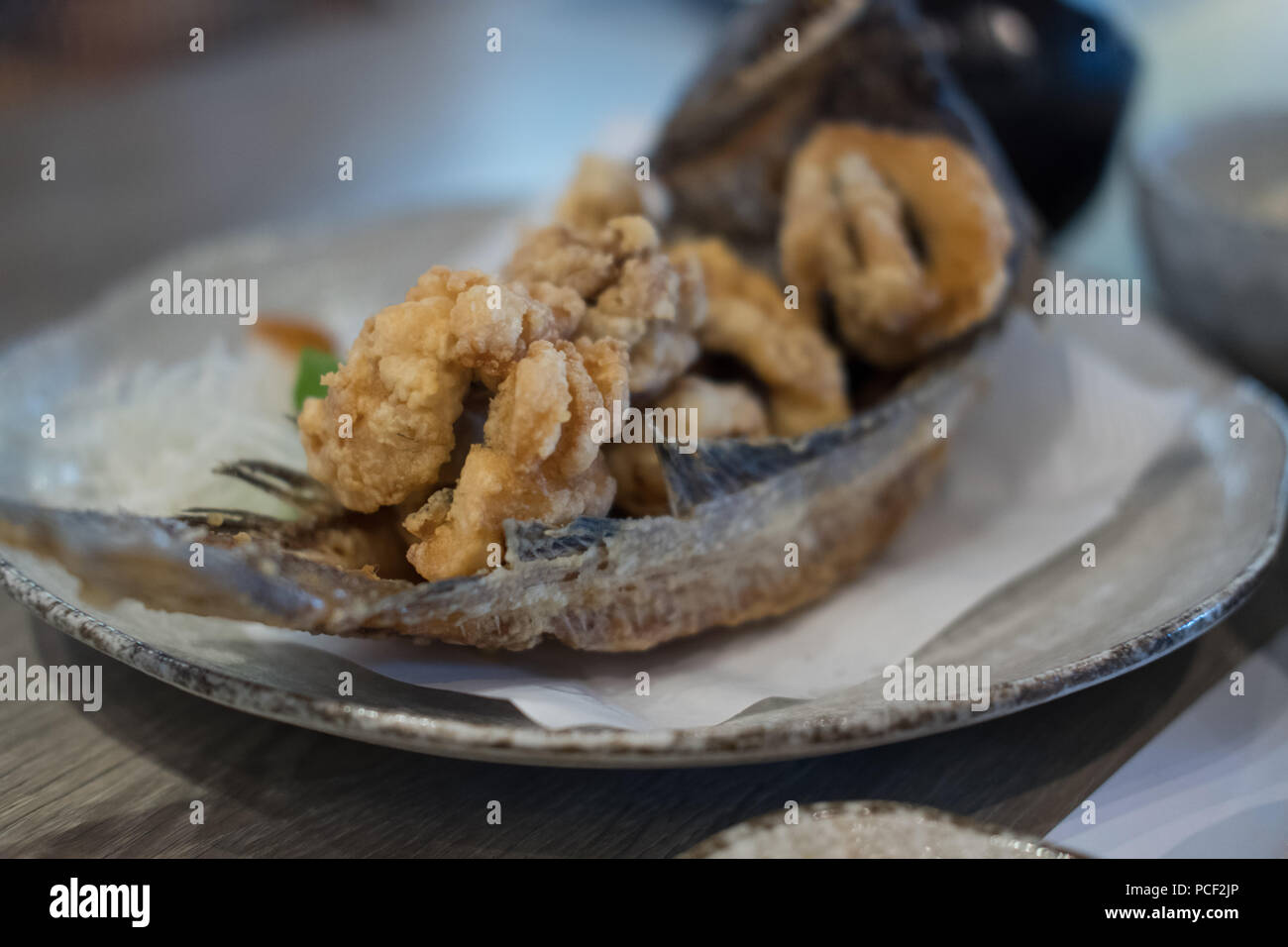 fried fish fillet. japanese food in restaurant Stock Photo - Alamy