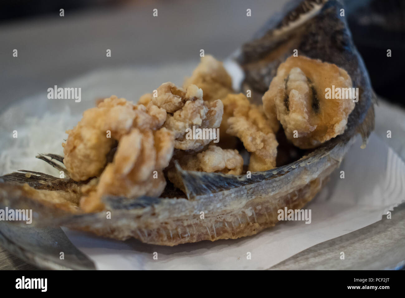 fried fish fillet. japanese food in restaurant Stock Photo - Alamy