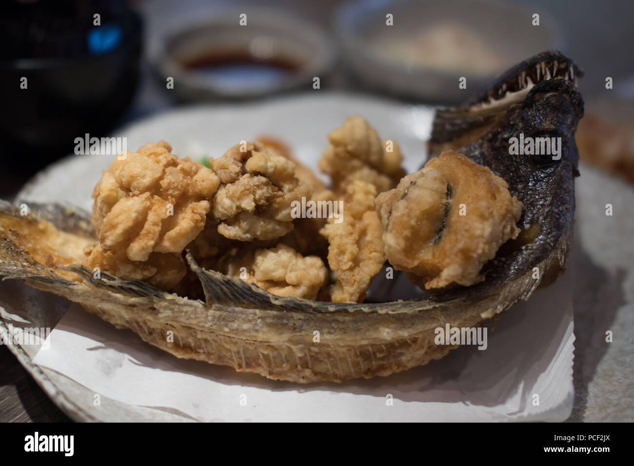 fried fish fillet. japanese food in restaurant Stock Photo - Alamy