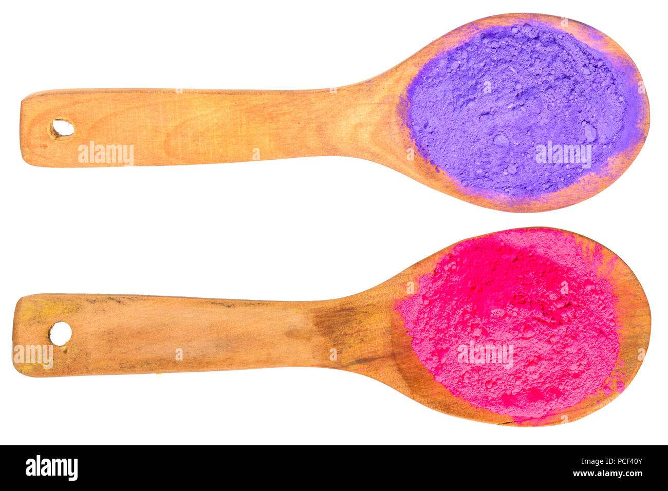 pink and purple powder on wooden spoons with clipping path in isolated ...