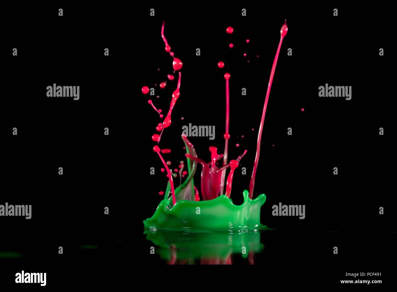 abstract color splash isolated on black background Stock Photo - Alamy
