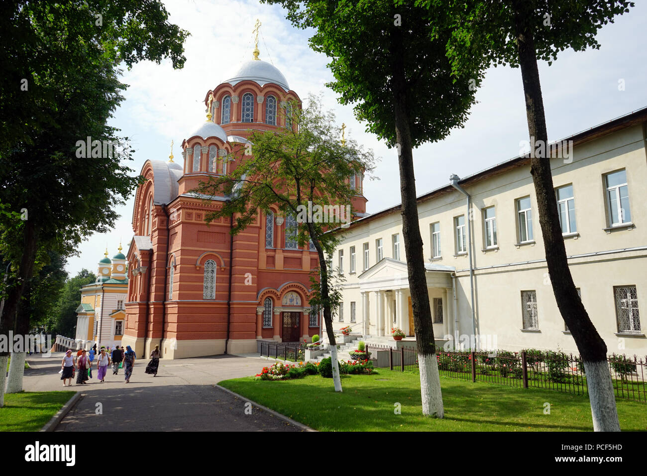 KHOTKOVO, RUSSIA - CIRCA JULY 2018 People in the inner yard of convent ...