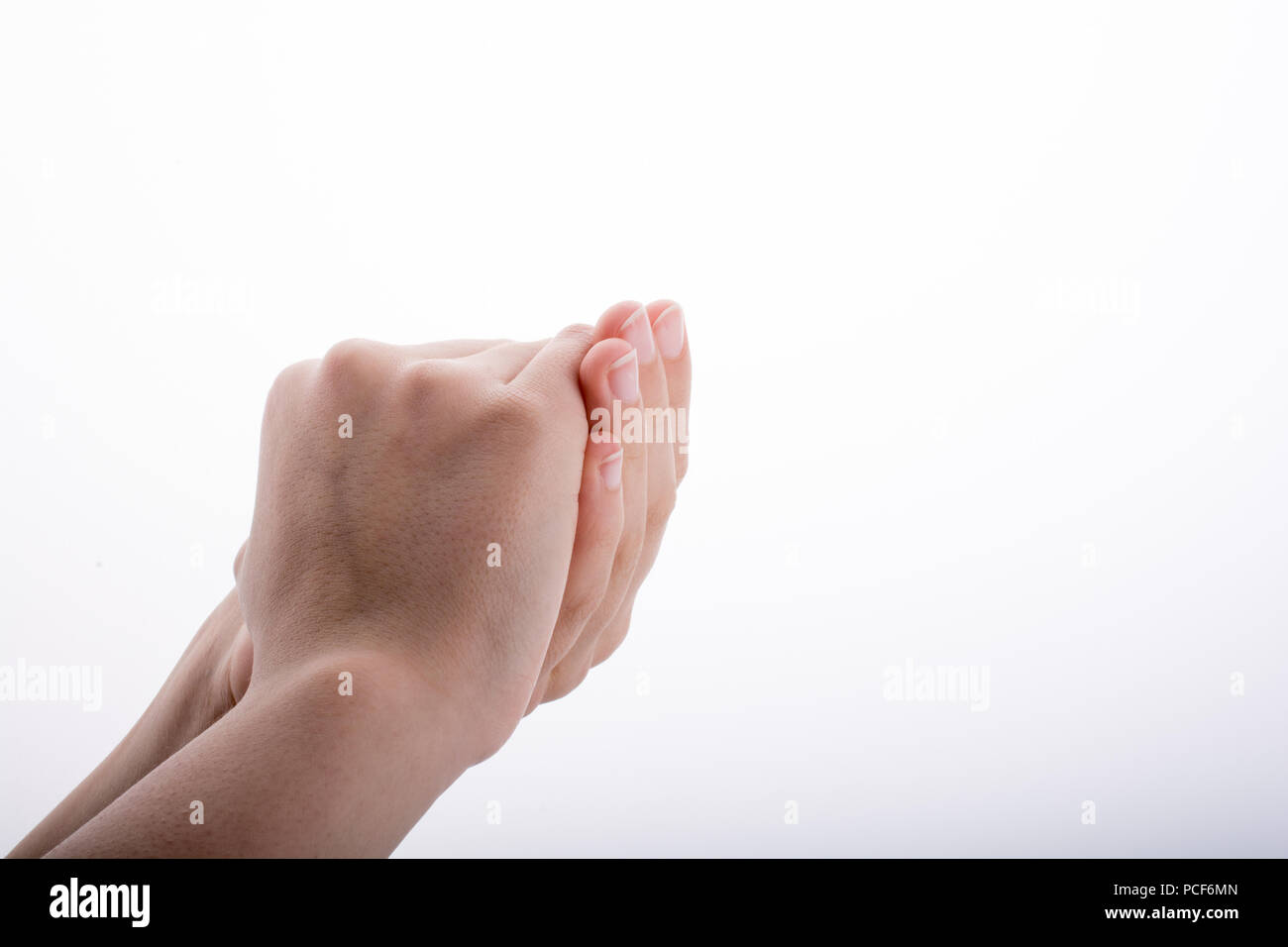 Hand hiding thumb hi-res stock photography and images - Alamy